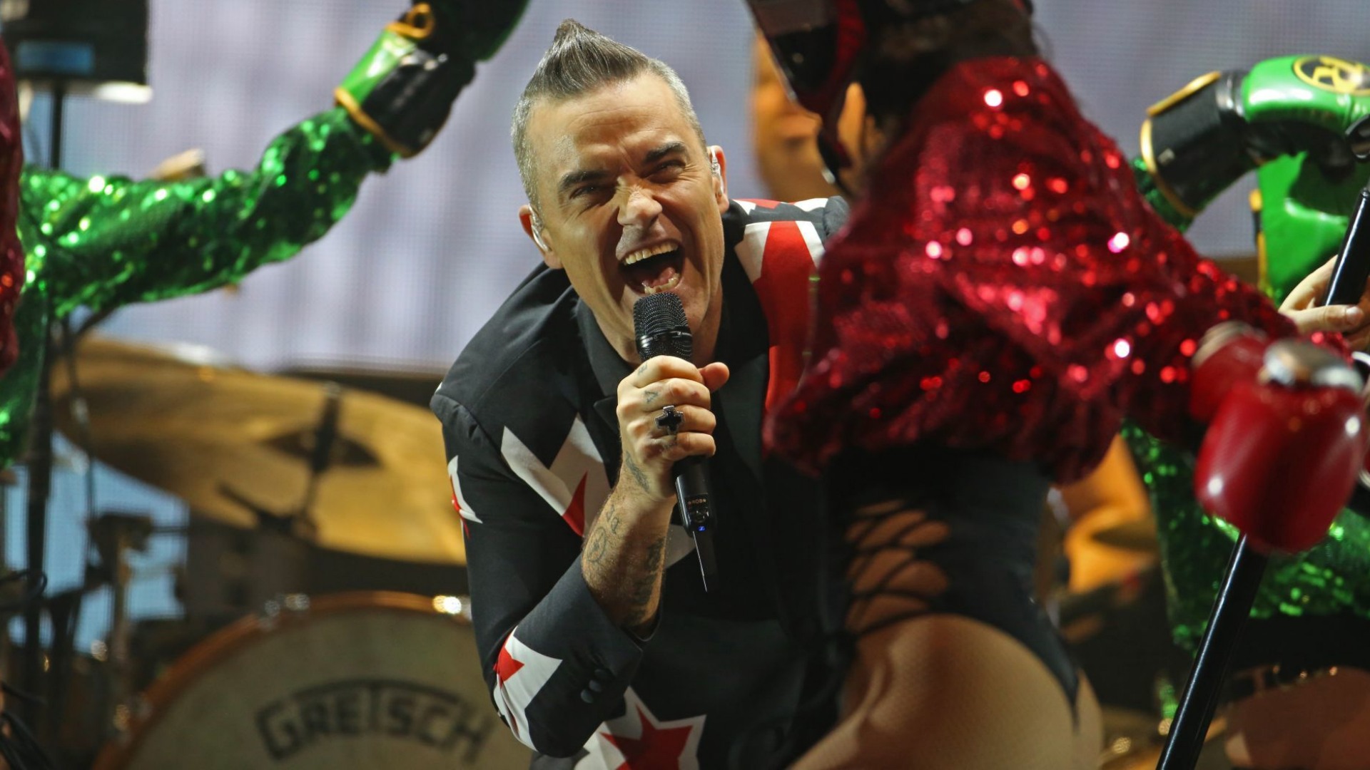 ¿Robbie Williams Será el Artista del Super Bowl 2026 de la NFL? Anuncio Desata Sospechas | N+